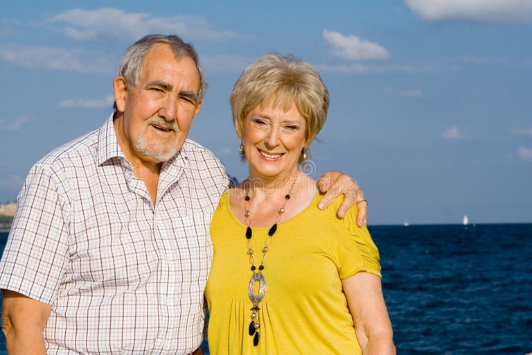 Happy Elderly Couple on Vacation Stock Image - Image of seniors, smile ...