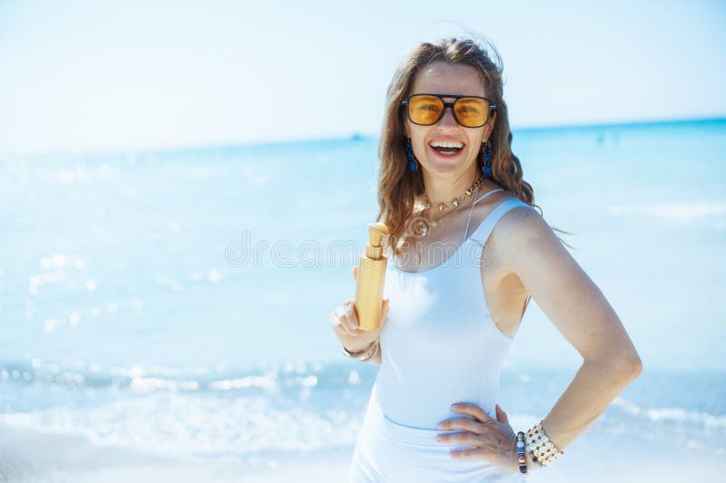 Happy Elegant Woman on Beach with Spf Stock Image - Image of screen ...