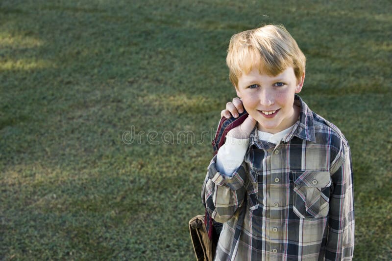 Happy Elementary School Boy with Bookbag Stock Photo - Image of angle ...