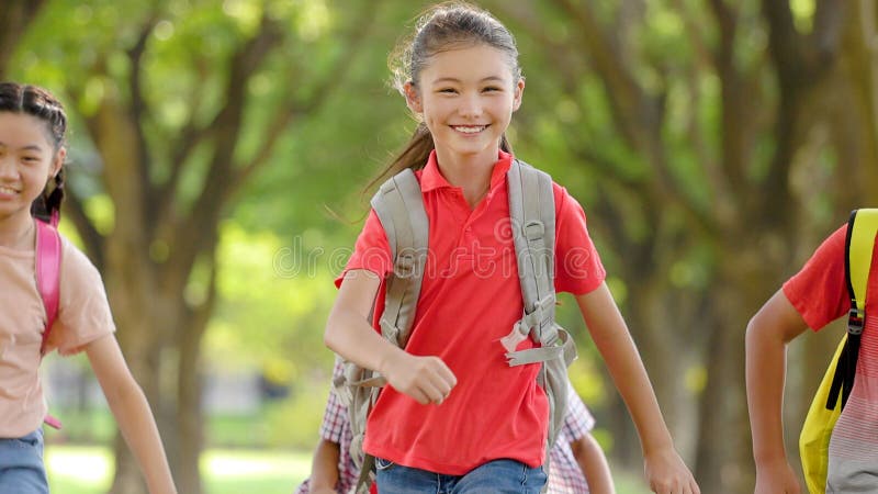 Happy Elementary School Kids Running at School. Back To School Stock ...