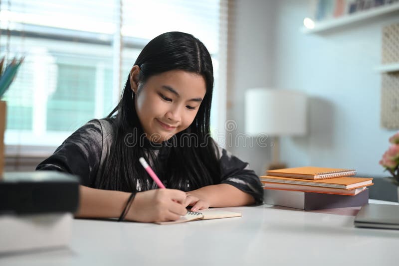 Elementary School Student Doing Homework in Living Room. Stock Image ...
