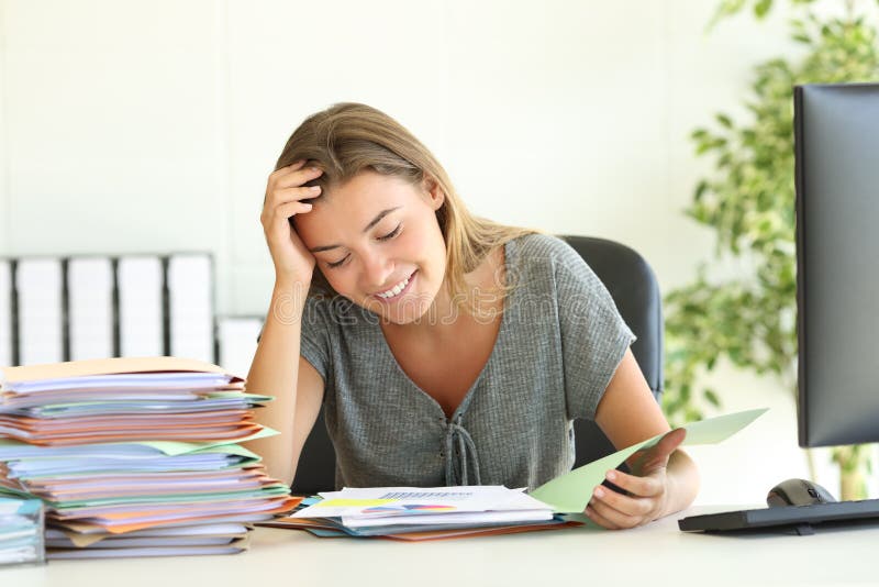 Happy Employee Reading Report at Office Stock Photo - Image of employed ...
