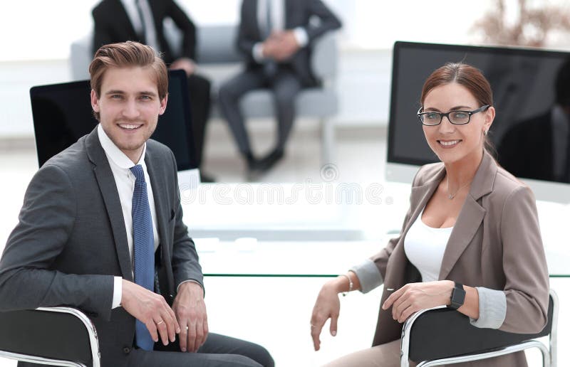 Happy Employees Sitting at the Office Desk Stock Image - Image of ...