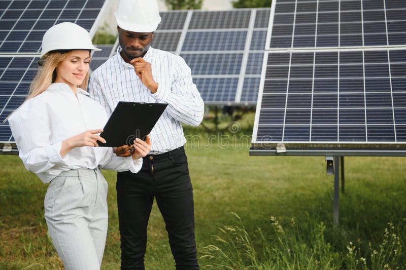 Happy Employees of Solar Power Plant Stock Photo - Image of team ...