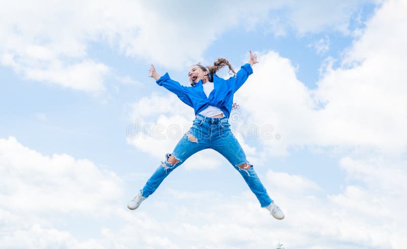 Happy Energetic Kid Feeling Free and Jumping High, Success Stock Photo ...