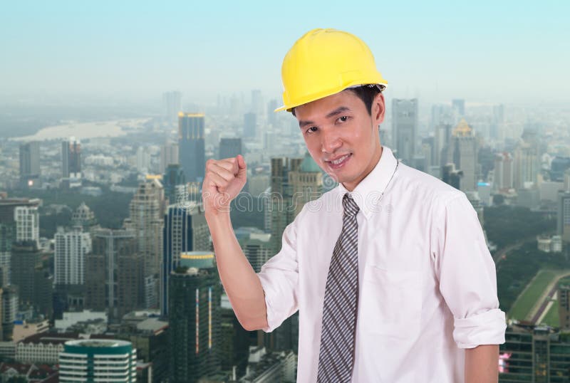 Happy Engineer with Arm Raised, Concept of Successful, City Back Stock ...