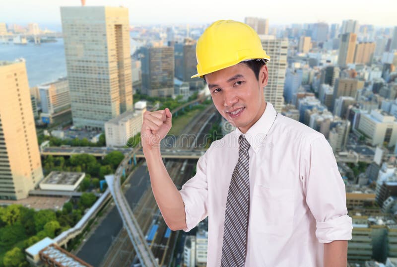 Happy Engineer with Arm Raised, Concept of Successful, City Back Stock ...