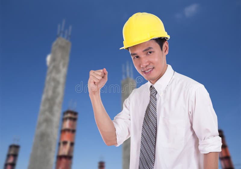 Happy Engineer with Arm Raised, Concept of Successful, City Back Stock ...