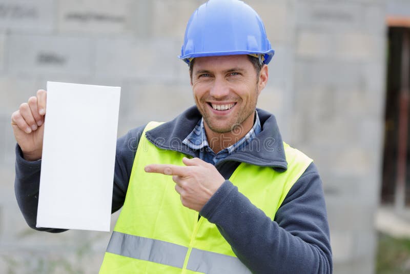 Happy Engineer Showing Empty Billboard Stock Image - Image of uniform ...