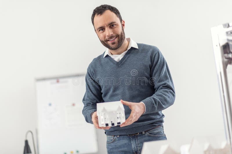 Cheerful Young Man Showing a 3D Model of House Stock Image - Image of ...