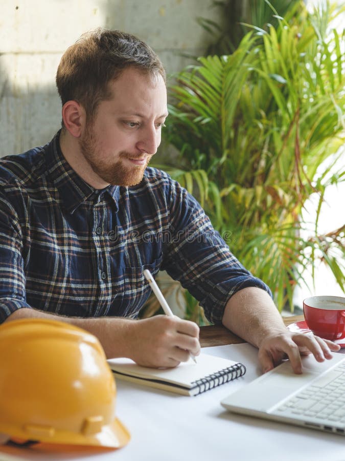 Engineer Working in Office and Drinking Coffee. Stock Photo - Image of ...