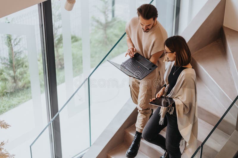 Happy Entrepreneurs Walk on Stairs, Working, Discussing and Achieving ... Happy Entrepreneurs Walk on Stairs, Working, Discussing and Achieving ...
