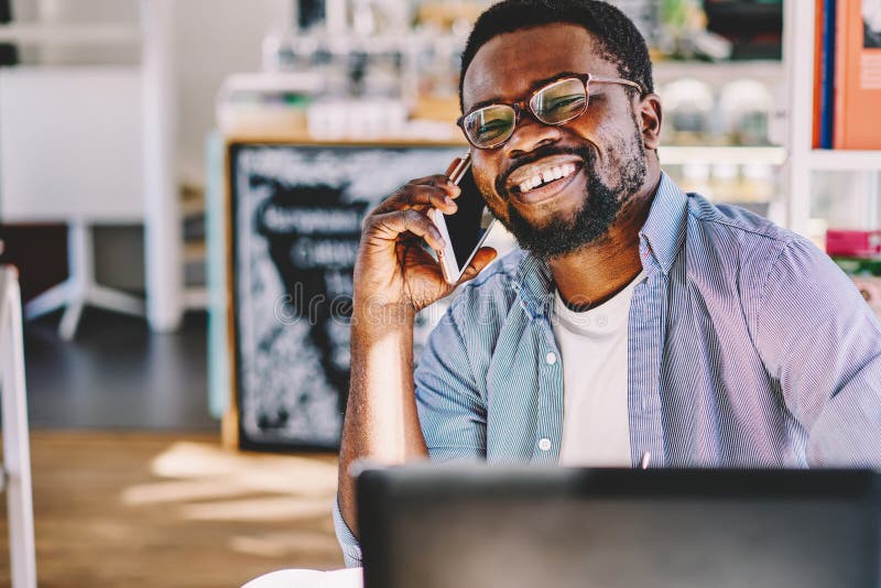 Happy Ethnic Man Phoning in Office Stock Photo - Image of communication ...