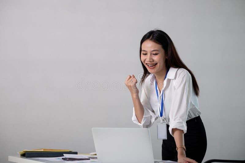 Happy Excited Business Woman in Office Working with Computer Make ... Happy Excited Business Woman in Office Working with Computer Make ...
