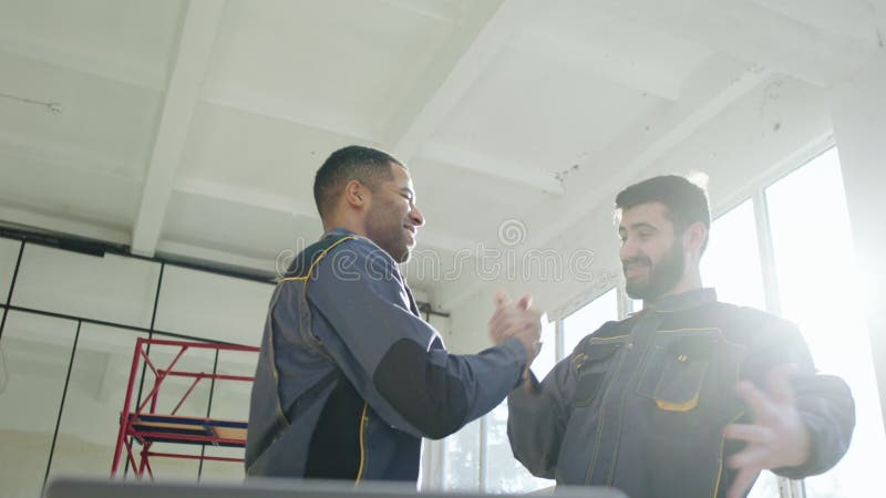 Happy and Excited Two Engineers Ending the Plan of Construction at ...