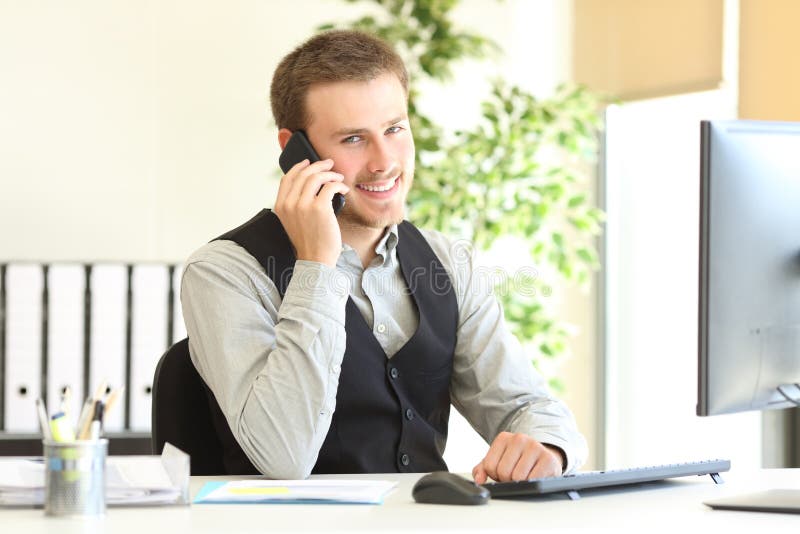 Happy Executive Talking on Phone Looking at Camera Stock Photo - Image ...