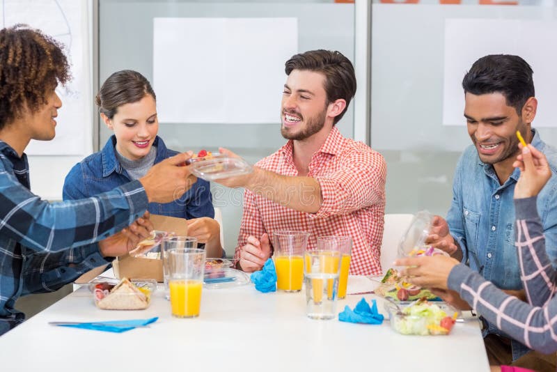 Happy Executives Interacting while Having Breakfast Stock Photo - Image ...