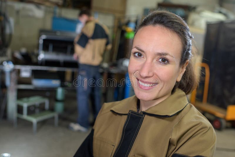 Happy Factory Employee Posing in Workshop Stock Photo - Image of ...