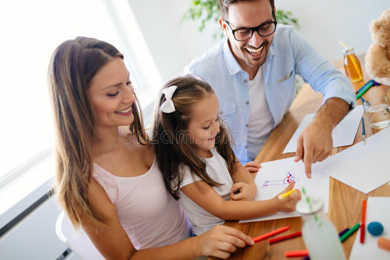 Happy Familiy Spending Fun Time at Home Stock Photo - Image of school ...