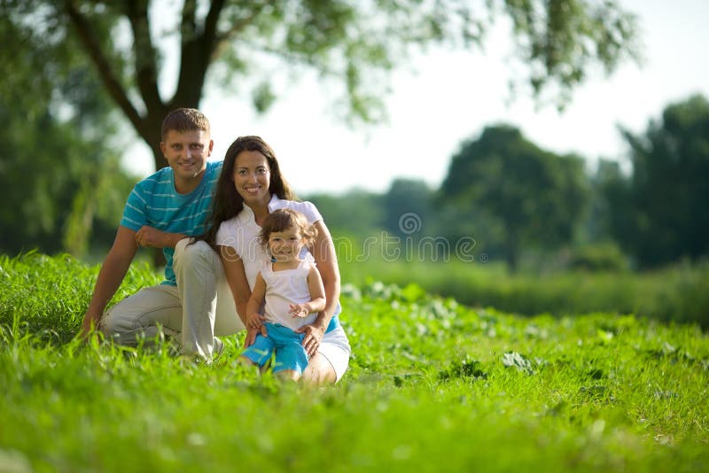 Happy Family stock image. Image of happy, family, grass - 13458325