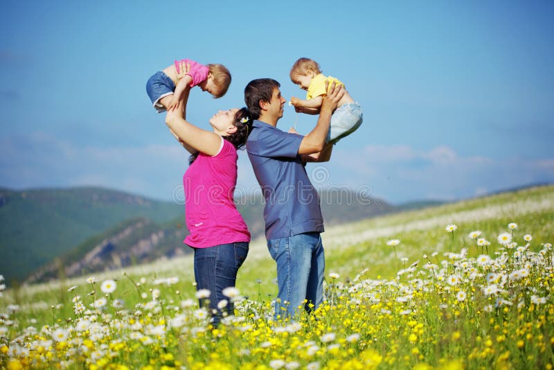 Happy family stock photo. Image of flowers, cheerful - 15221818