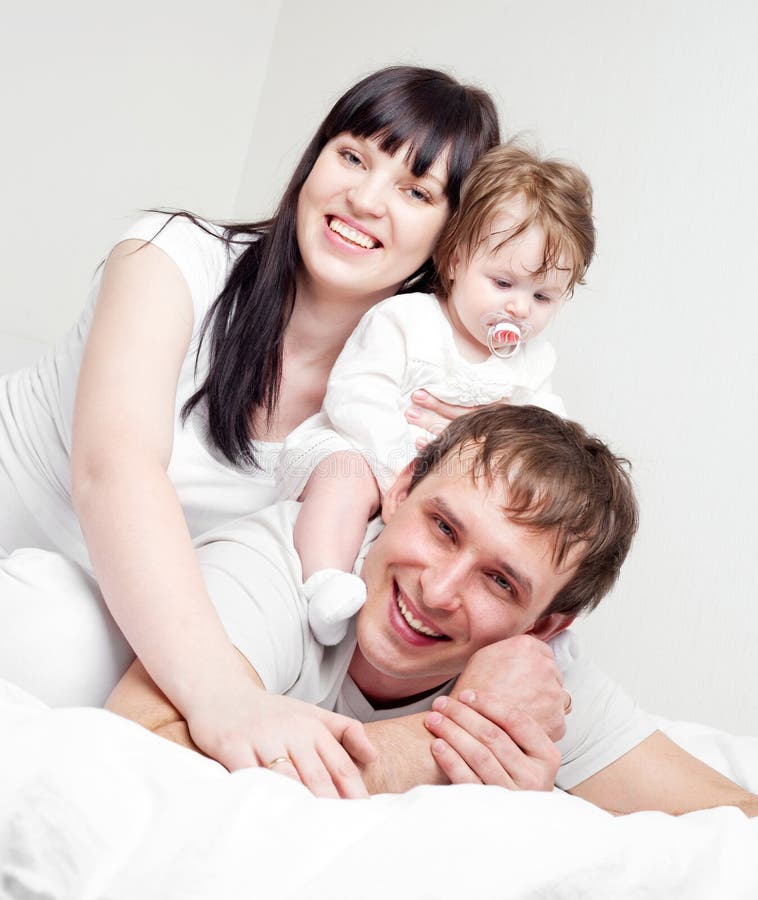 Portrait of the Beautiful Young Happy Family Stock Image - Image of ...