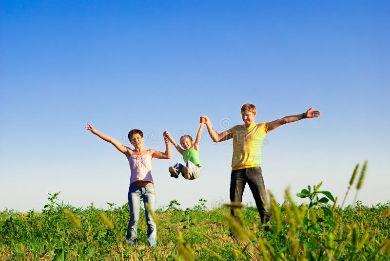Happy Active Family Jumping Stock Image - Image of outdoors, fitness ...