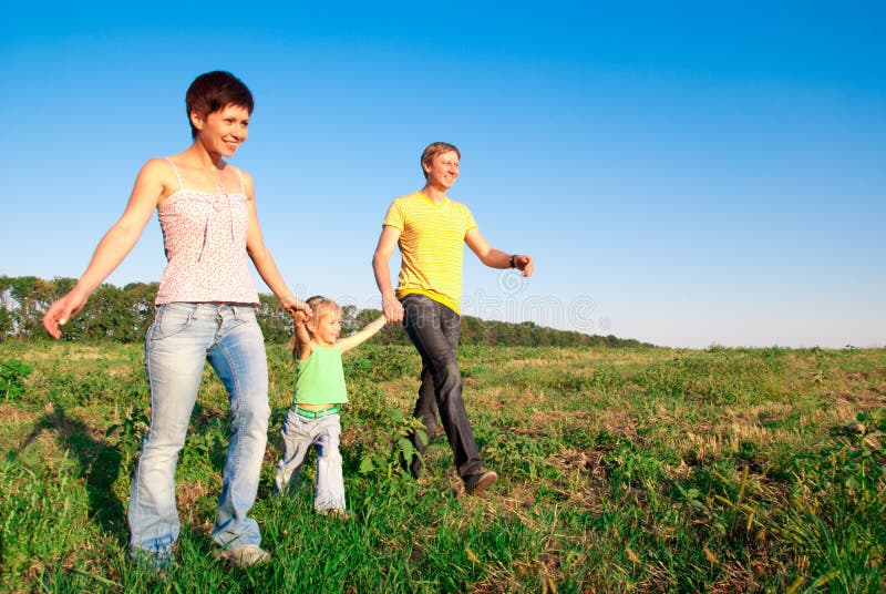 Family Playing Tag on Meadow in Summer Stock Image - Image of lifestyle ...