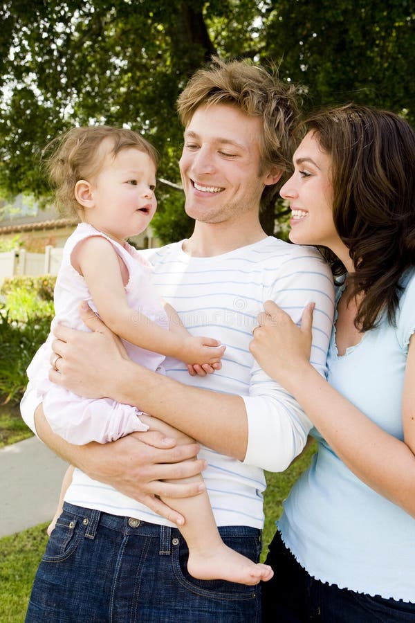 Happy young family group stock image. Image of motherly - 3260925