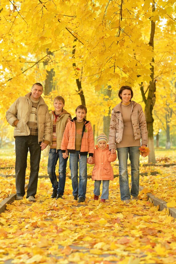 Happy Family in Autumn Forest Stock Photo - Image of father, golden ...