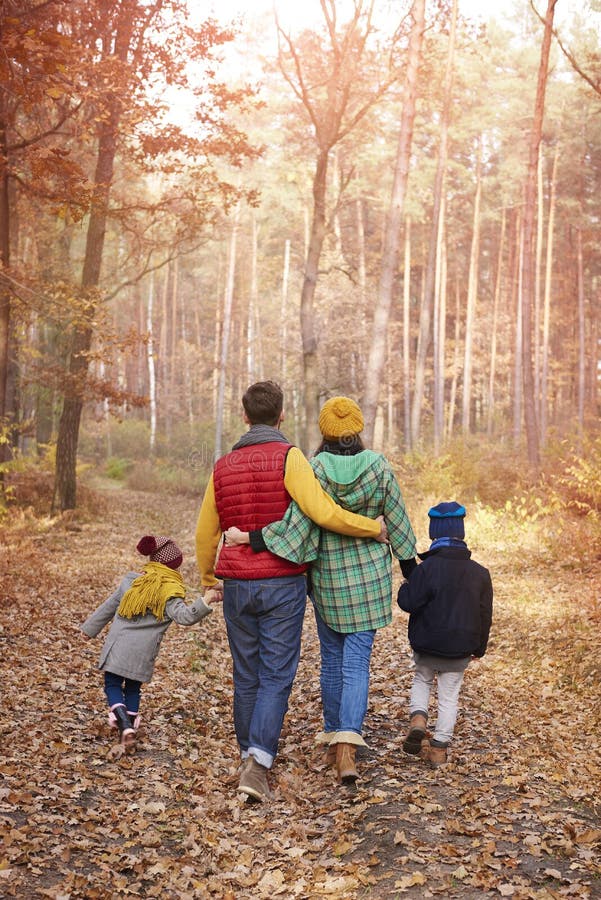 Happy family during autumn stock photo. Image of people - 61894450