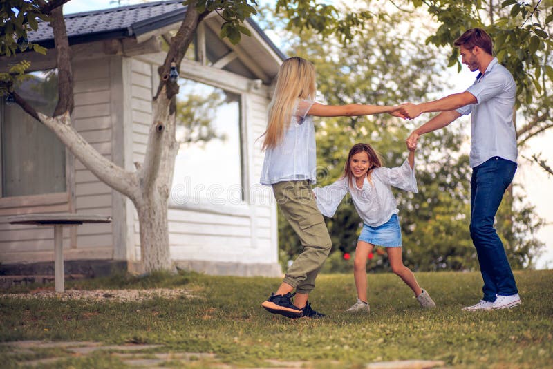 Happy family in backyard stock photo. Image of little - 217957662