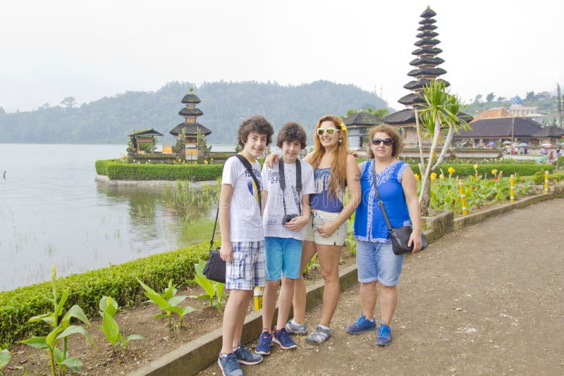 Happy family in Bali stock photo. Image of twin, glass - 66778208
