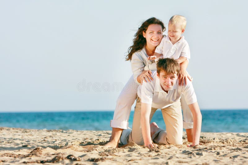 Happy Family Having Fun at Tropical Beach. Stock Image - Image of ...