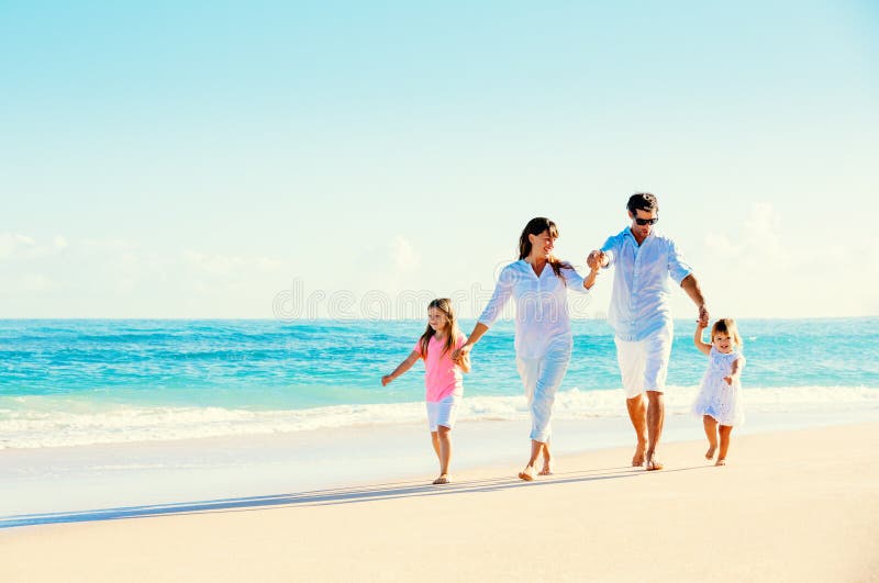 Happy Family on the Beach stock image. Image of happy - 45070127