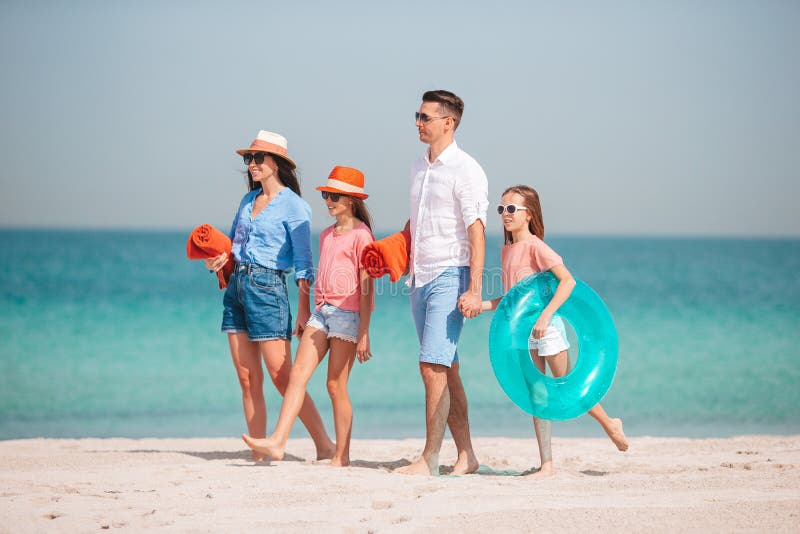 Happy Family on the Beach during Summer Vacation Stock Image - Image of ... Happy Family on the Beach during Summer Vacation Stock Image - Image of ...