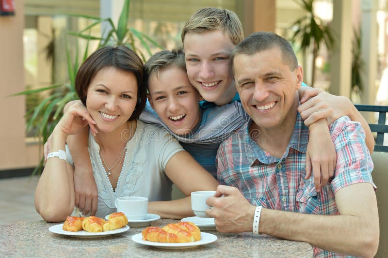 Happy family at breakfast stock photo. Image of love - 77969898