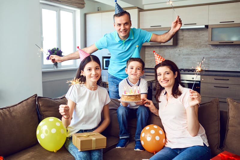 Happy Family with Cake on Birthday Party Stock Photo - Image of indoor ...