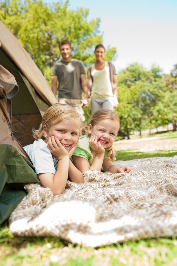 Family camping in the park stock photo. Image of father - 18821388