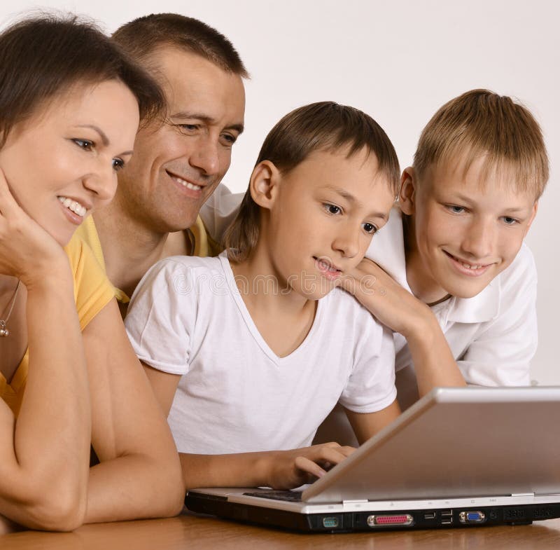 Family with computer stock image. Image of attractive - 20610187