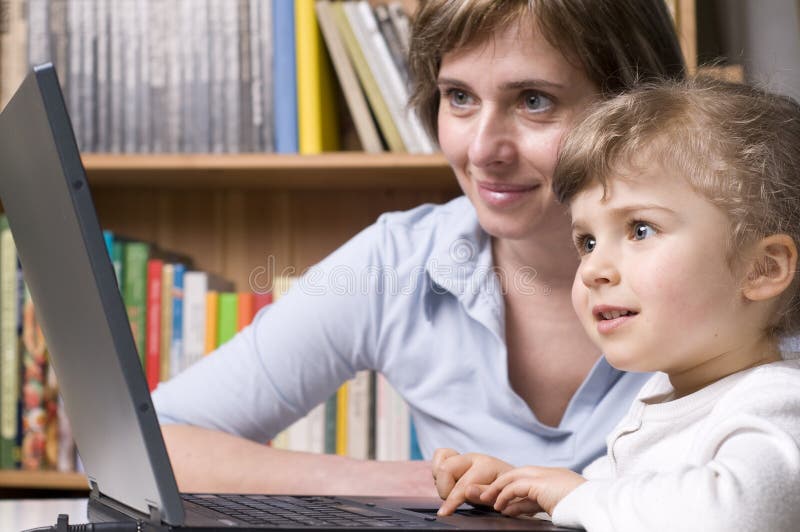 Happy family at computer stock photo. Image of child, playful - 4816762