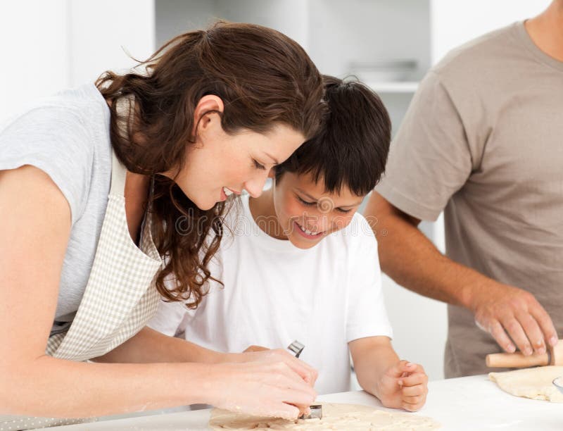 Happy Family Cooking Biscuits Together Stock Image - Image of kitchen ...