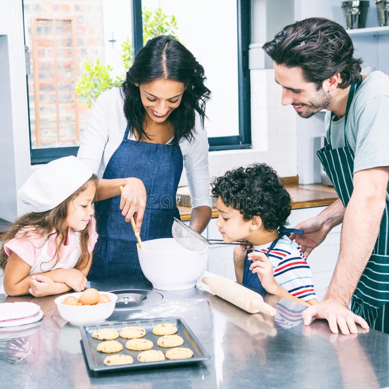 Happy Family Cooking Biscuits Together Stock Photo - Image of enjoyment ...