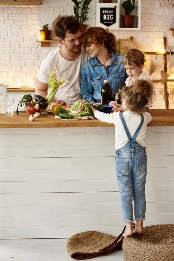 Happy Family Cooking in the Kitchen Stock Image - Image of girl, happy ...