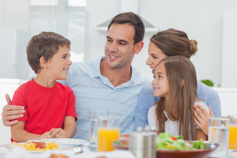 Happy Family during the Dinner Stock Photo - Image of cheerful ...