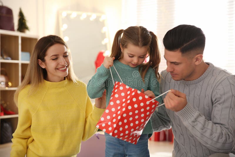 Happy Family Doing Christmas Shopping in Store Stock Image - Image of ...
