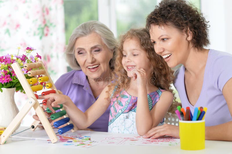 Happy Family Doing Homework Stock Photo - Image of european, female ...