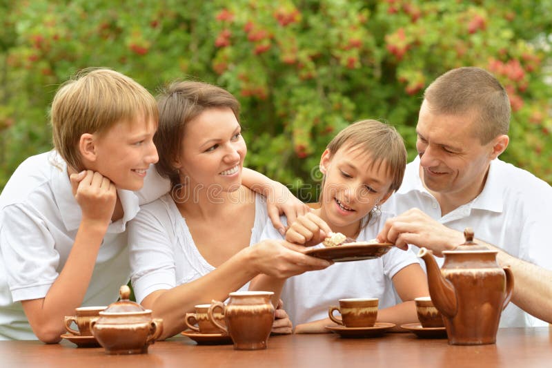 Family Drinking Tea Outdoors Stock Photo - Image of parents, mother ...