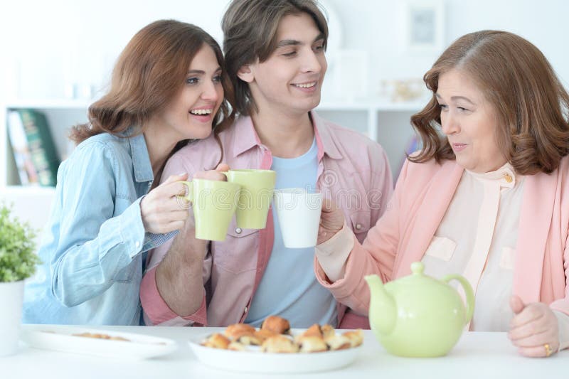 Happy Family Drinking Tea Together Stock Image - Image of beautiful ...