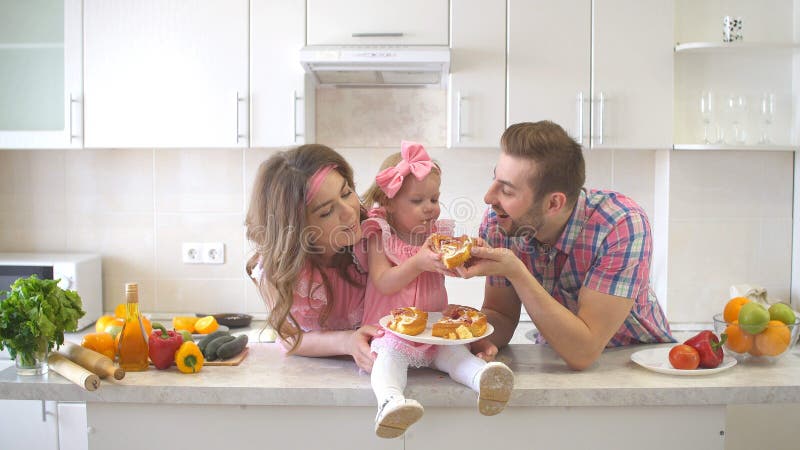 Happy Family Eating Cake in the Kitchen Stock Photo - Image of healthy ...